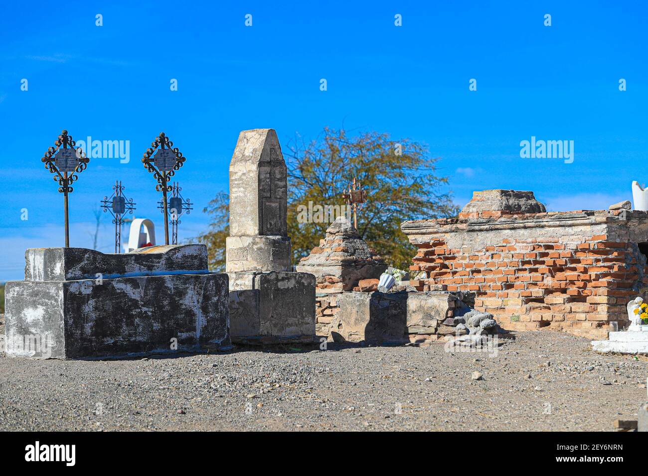 Headstones and old graves from the cemetery in the town of Oquitoa ...