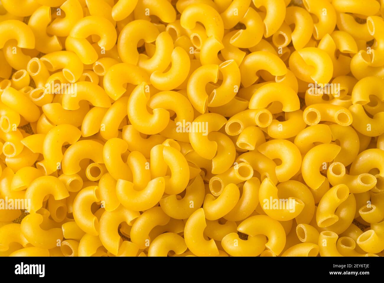 Dry Organic Macaroni Elbow Pasta in a Bowl Stock Photo - Alamy