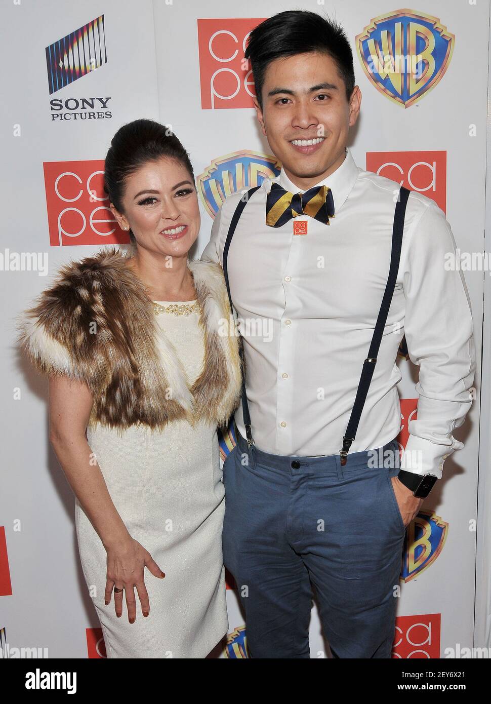 Jennifer Sanderson & Bing Chen attends The CAPE Holiday Party held at ...