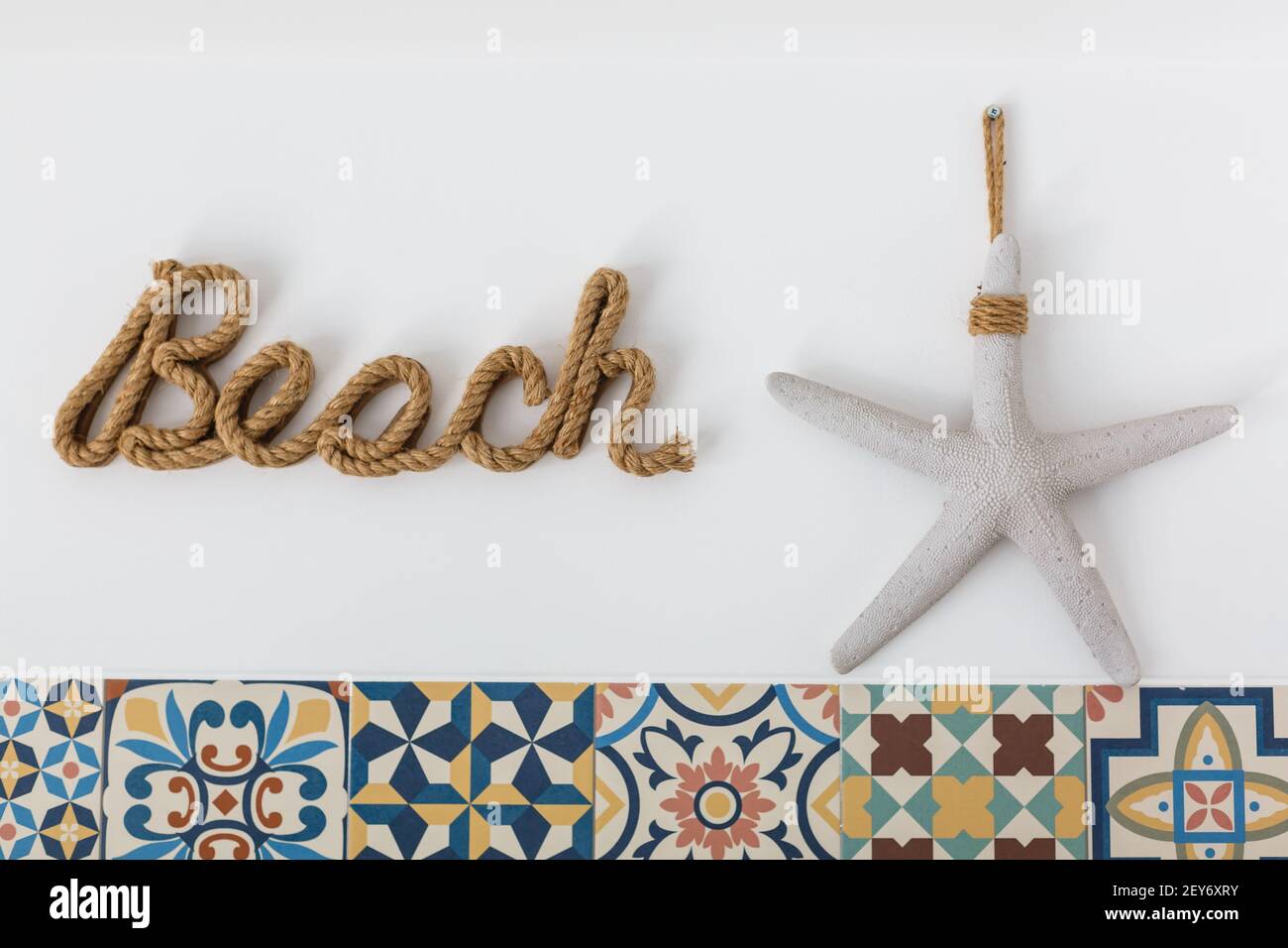 Rope hand drawn lettering Beach Stock Photo - Alamy