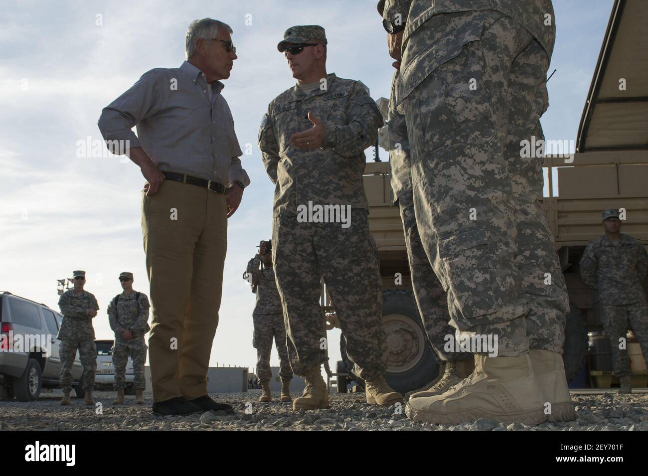 Secretary of Defense Chuck Hagel speaks with Lt. Col. Dave DeFelice ...
