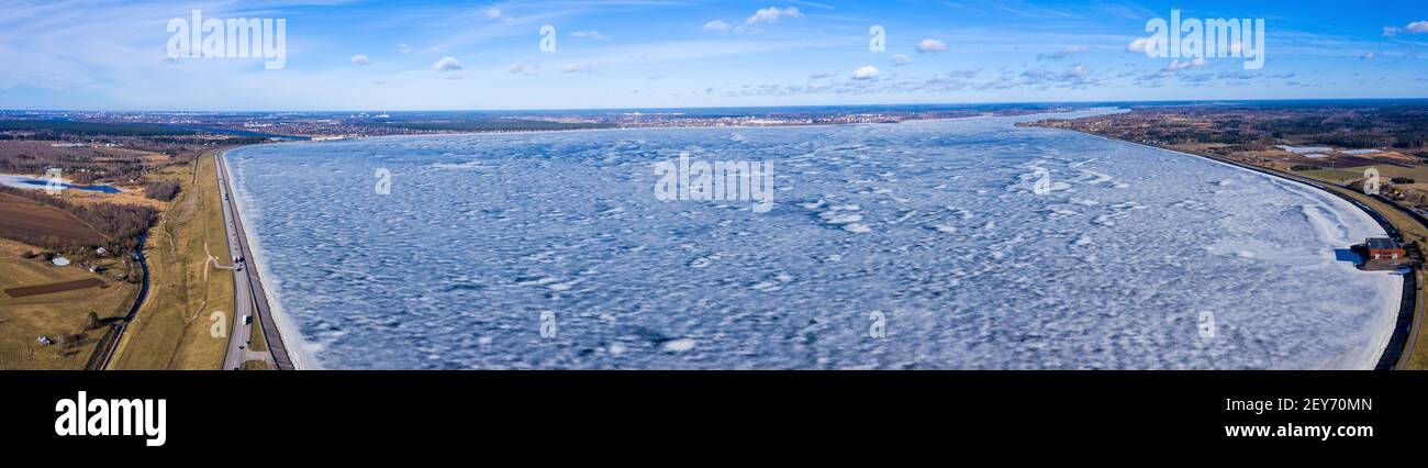 Panoramic aerial view of the winter dam near hydroelectric power plant ...