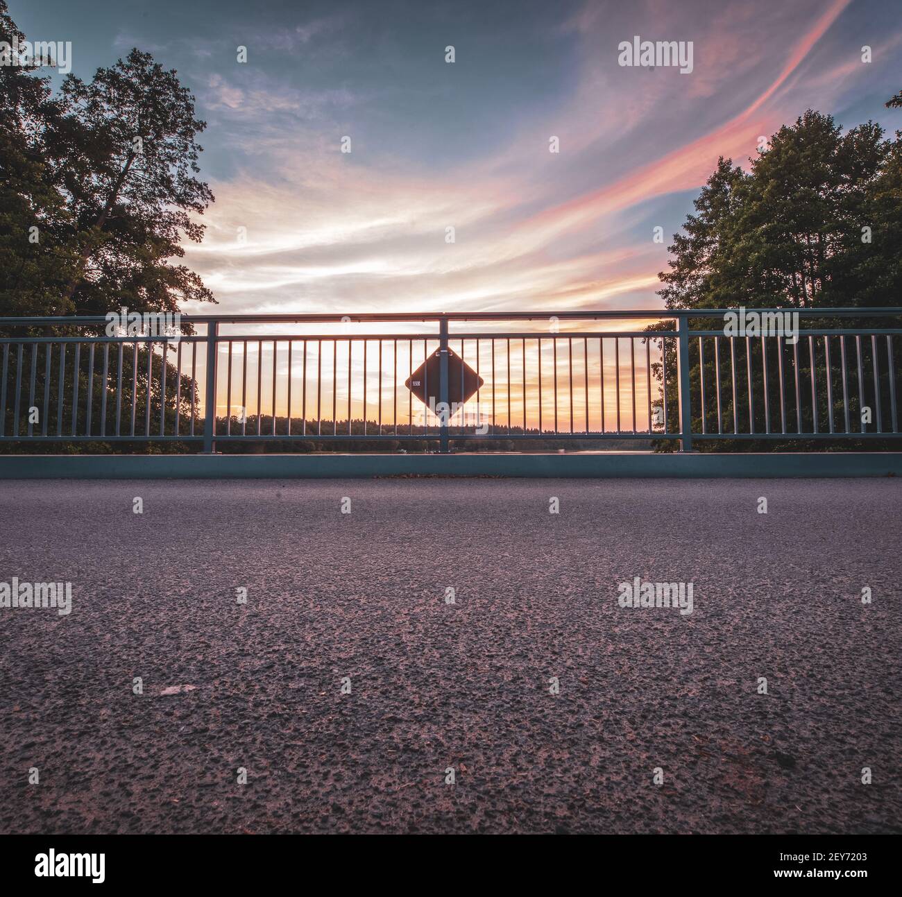 A mesmerizing view of a wonderful sunset from a bridge Stock Photo - Alamy
