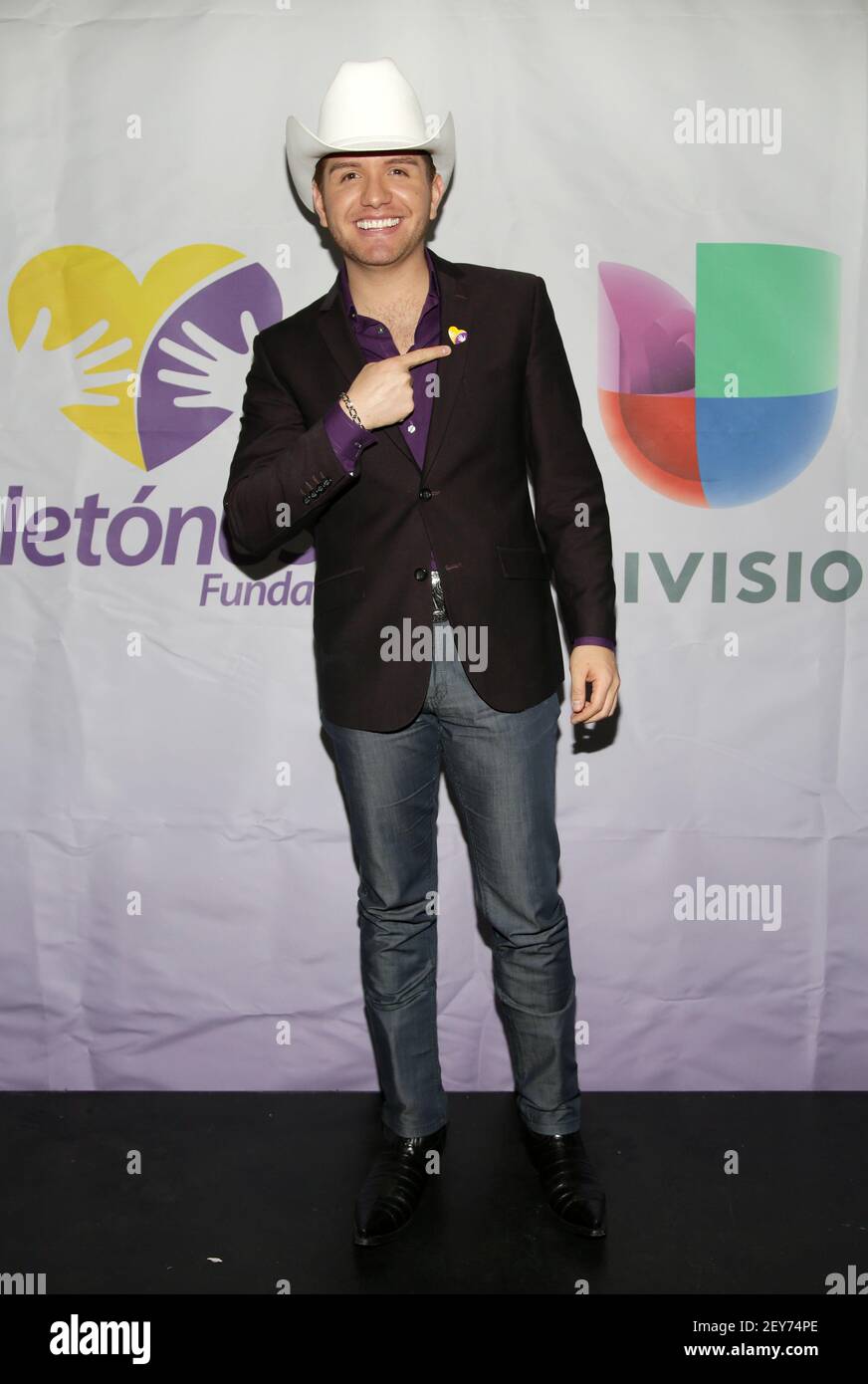 MIAMI-FLORIDA, DECEMBER 12, 2014: El Dasa attends the Univision Teleton ...
