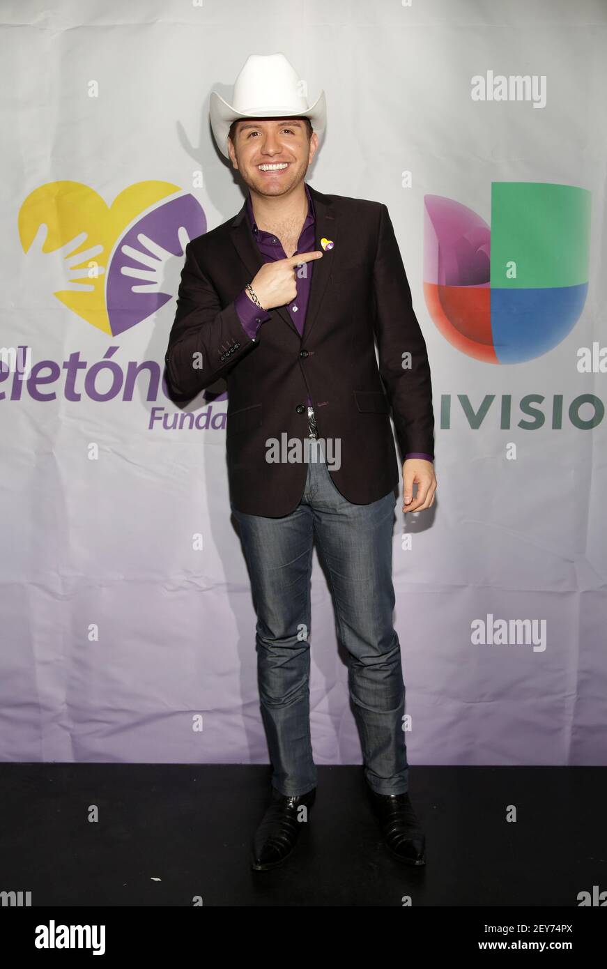 MIAMI-FLORIDA, DECEMBER 12, 2014: El Dasa attends the Univision Teleton ...