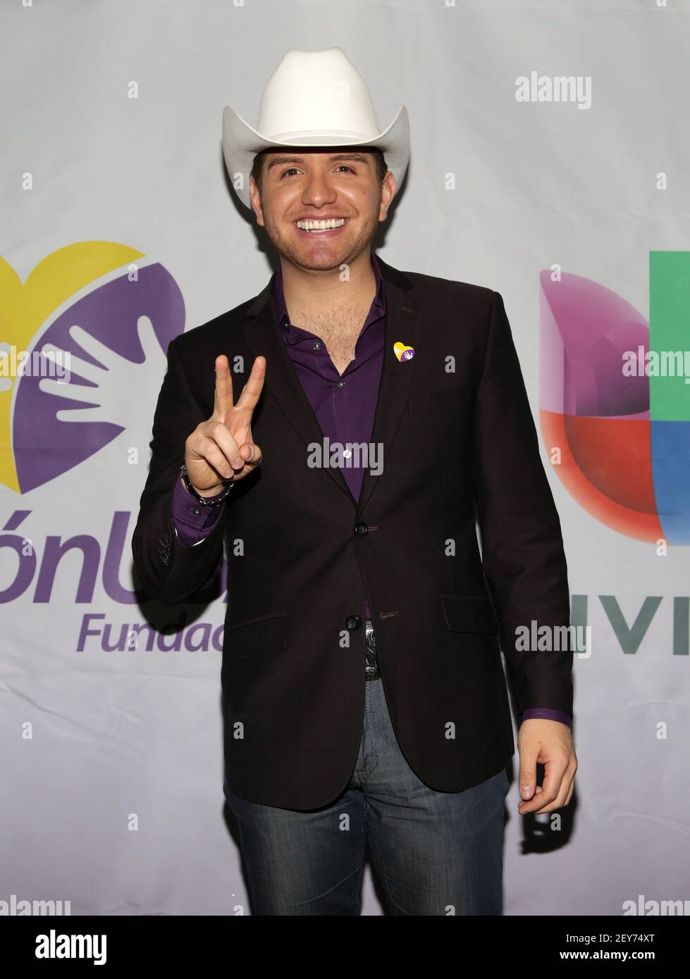MIAMI-FLORIDA, DECEMBER 12, 2014: El Dasa attends the Univision Teleton ...