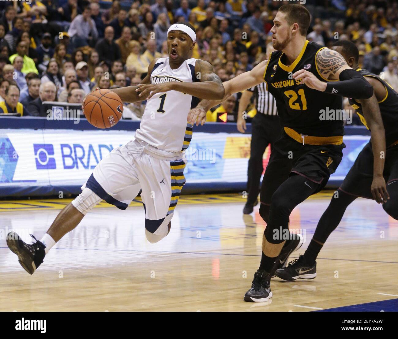 Marquette's Duane Wilson (1) drives against Arizona State's Eric ...