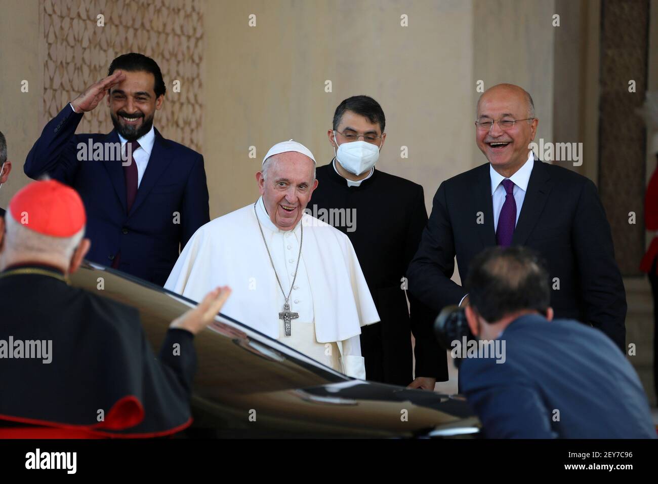 Baghdad, Iraq. 05th Mar, 2021. Iraqi President Barham Saleh (R) greets ...