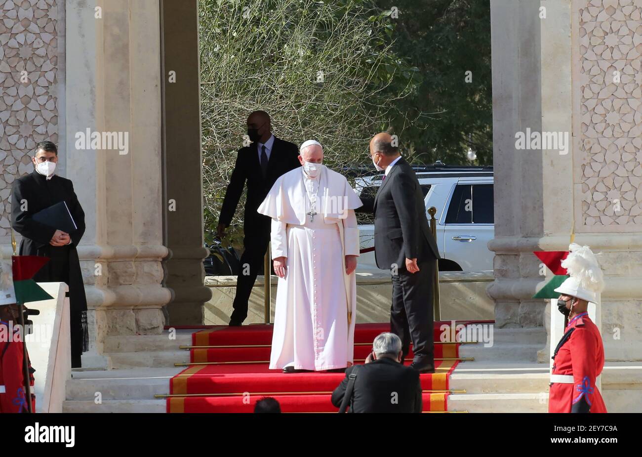 Baghdad, Iraq. 05th Mar, 2021. Iraqi President Barham Saleh (R) greets ...