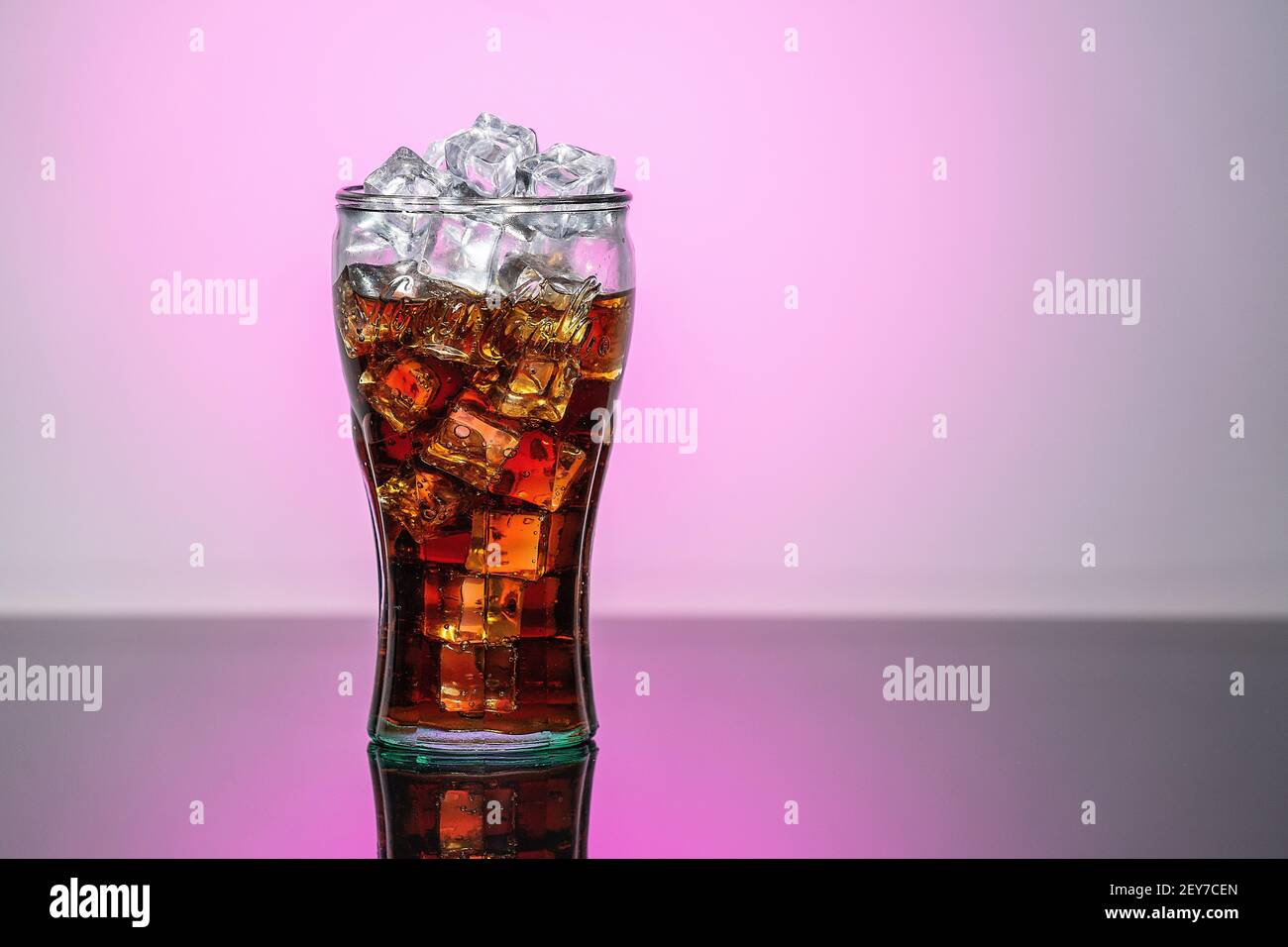Original glass of Coca Cola with ice and Coca Cola. UK, England, March ...