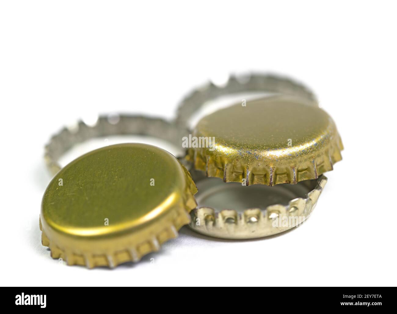 Bottle caps isolated against a white background Stock Photo - Alamy