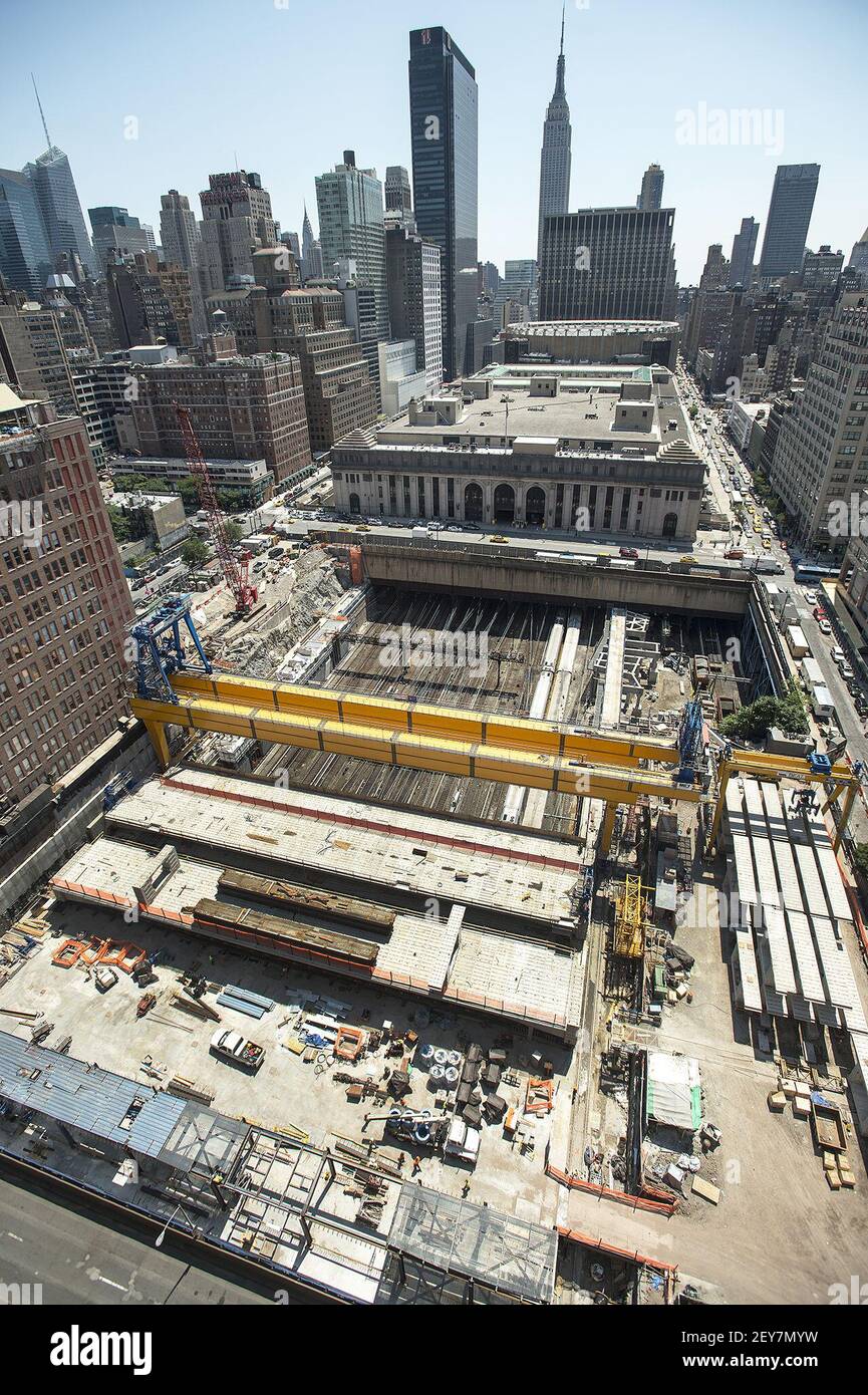 Giant cranes and boring machines work in tight quarters with the Long ...