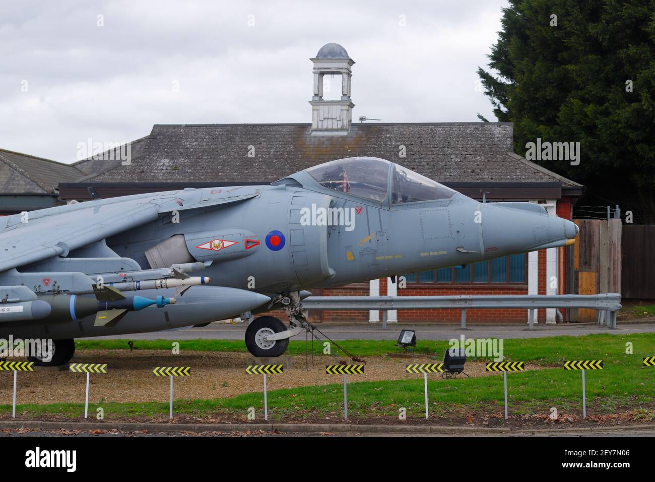 A decommissioned Harrier GR7A sits as a gate guard at the entrance to ...