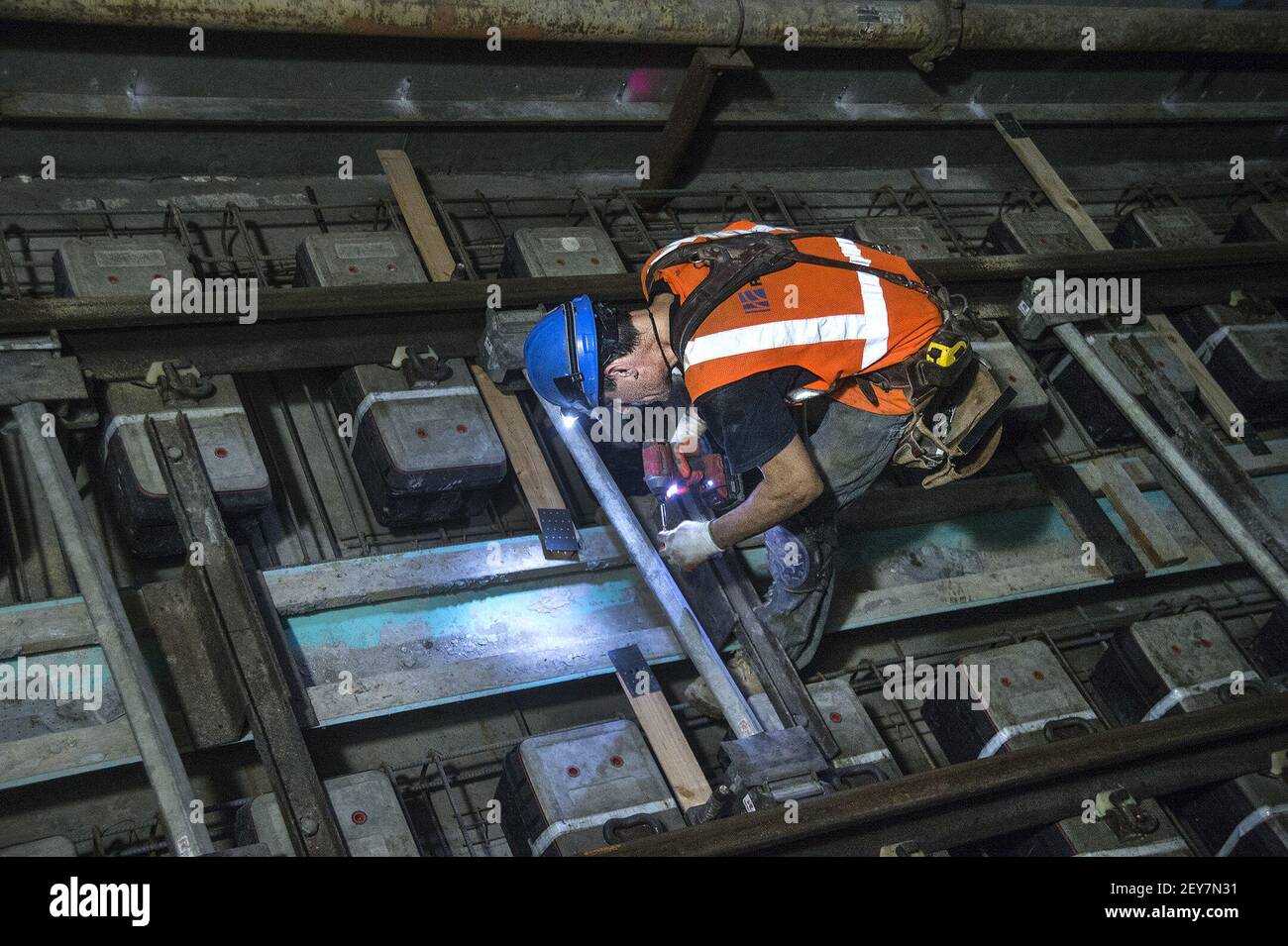 Workers pour concrete at the future 96th station of the Second Avenue ...