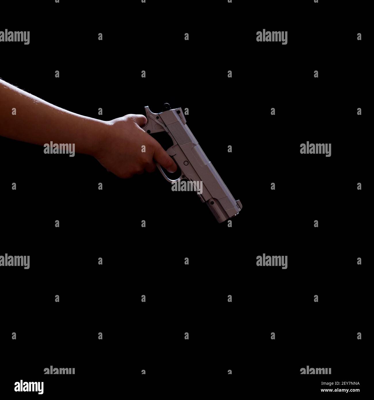 Hand holding gun hi-res stock photography and images - Alamy