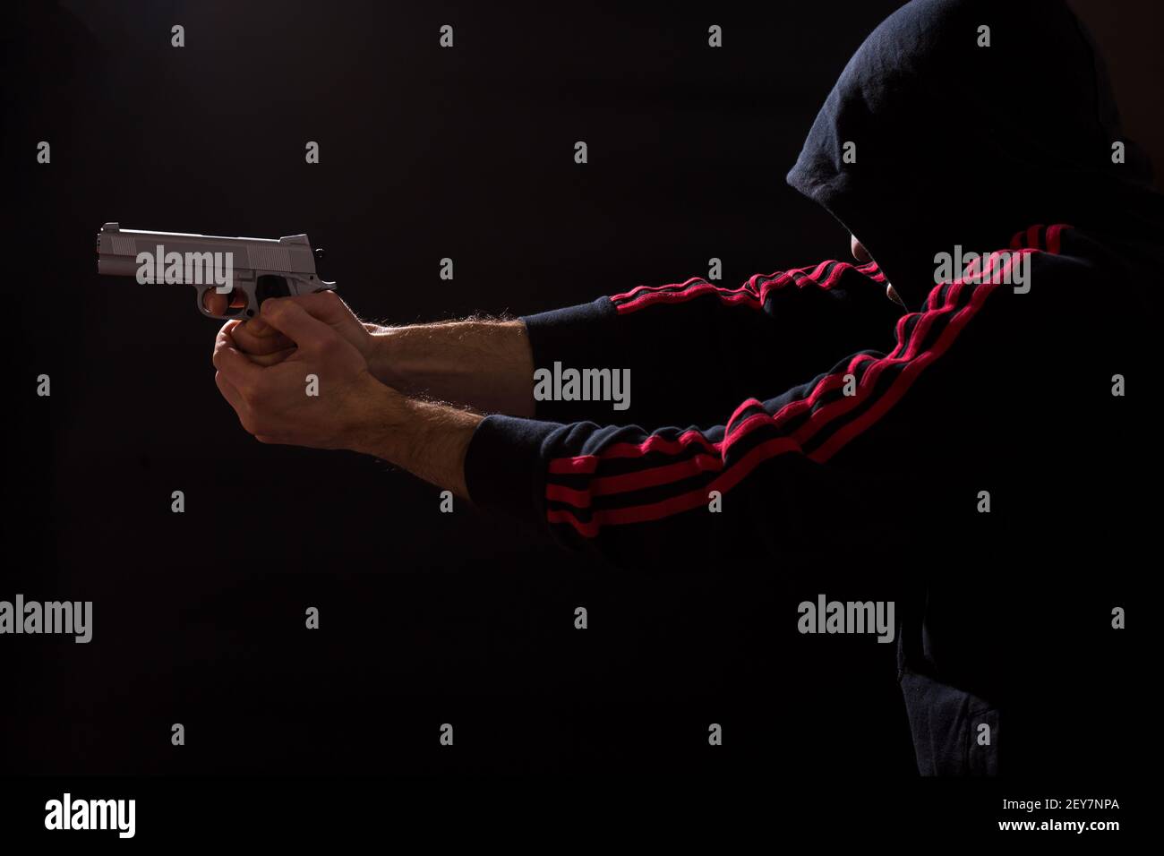 Pointing gun at shadow hi-res stock photography and images - Alamy