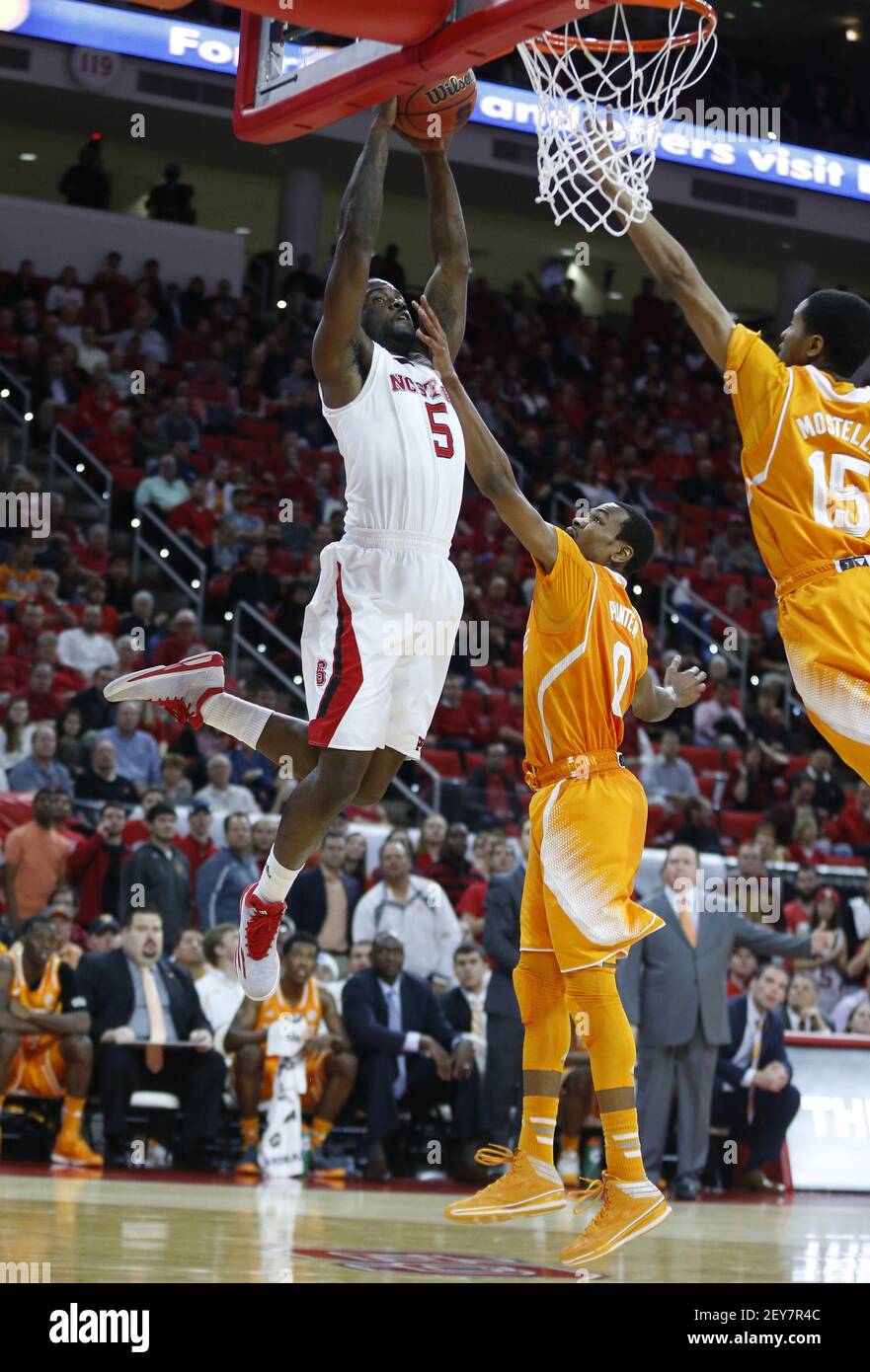 North Carolina State's Desmond Lee (5) is fouled as he drives to the ...