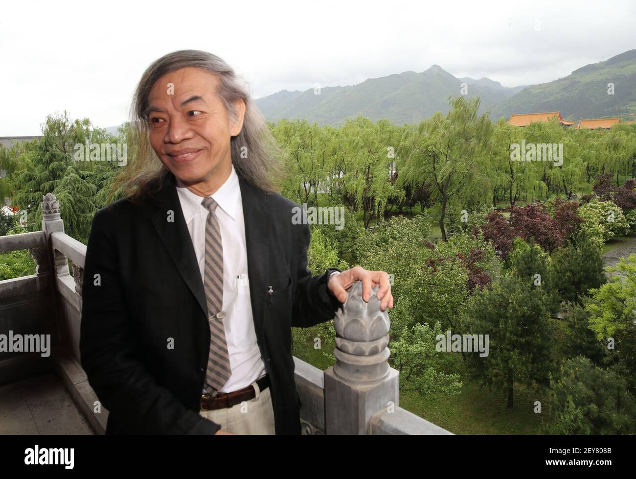--FILE--Cai Zhizhong with long hair attends the opening ceremony of Cai ...