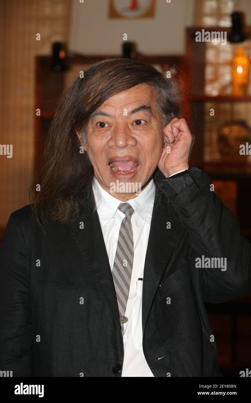 --FILE--Cai Zhizhong with long hair attends the opening ceremony of Cai ...