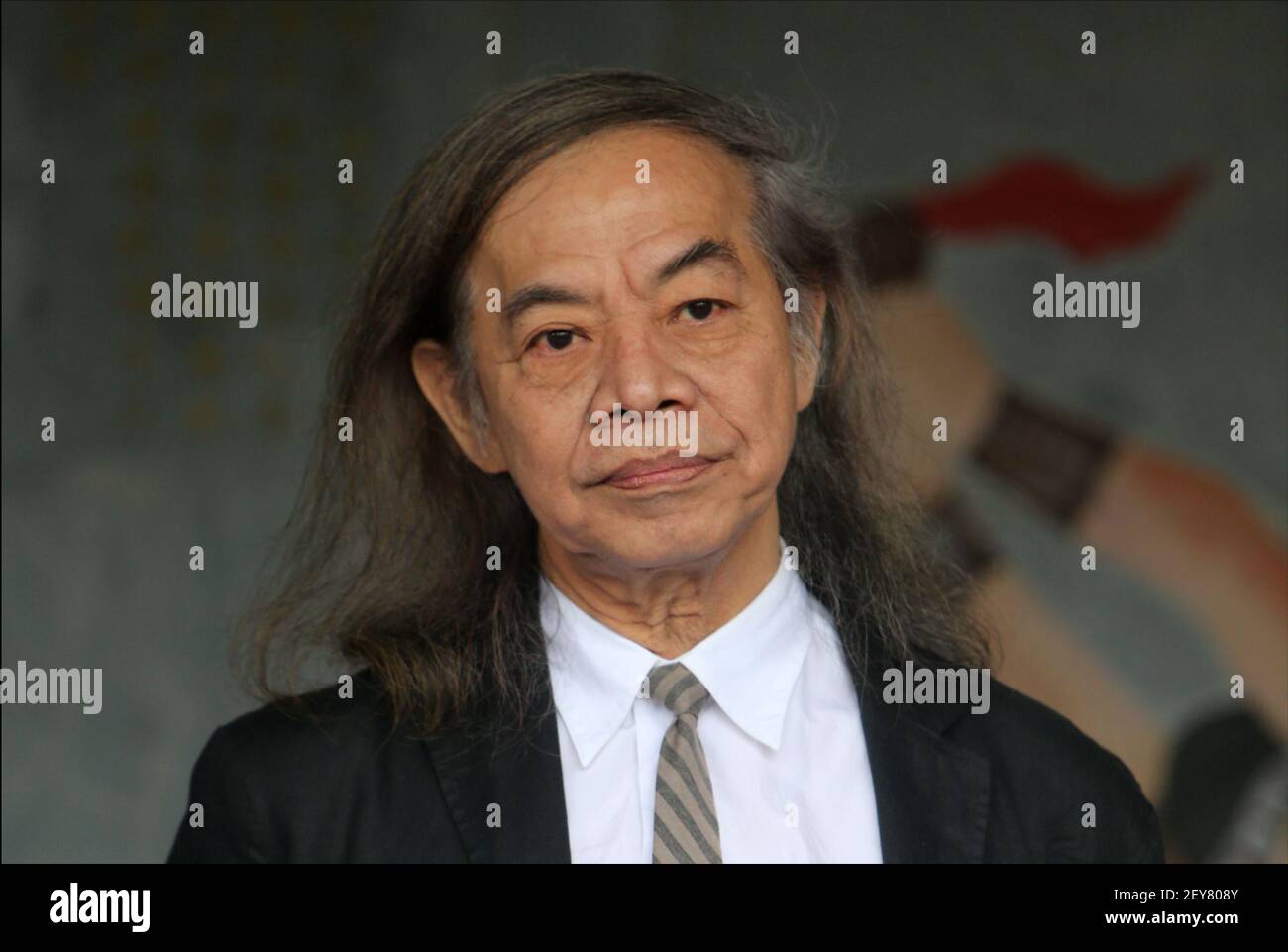 --FILE--Cai Zhizhong with long hair attends the opening ceremony of Cai ...
