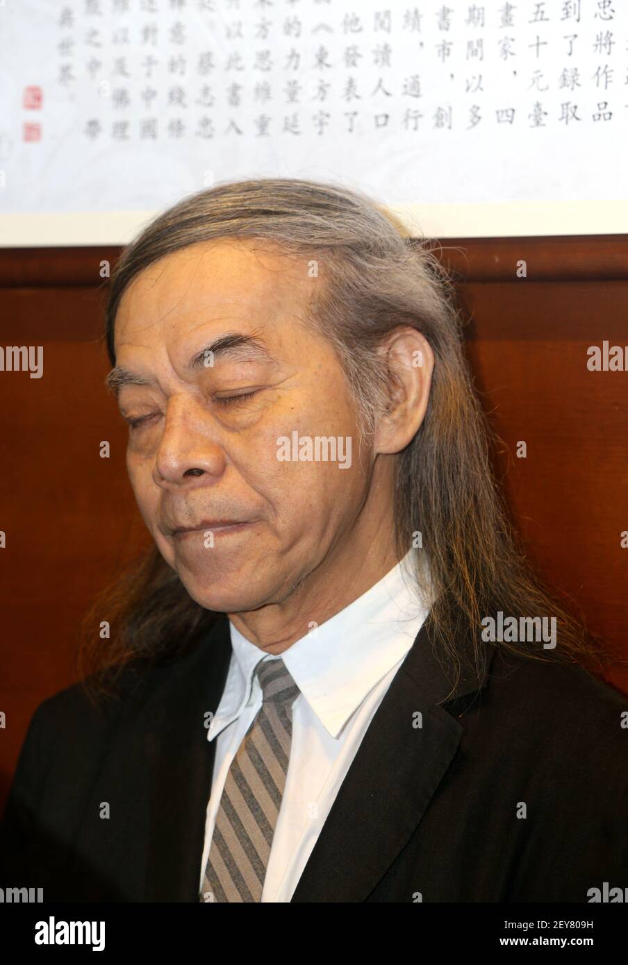 --FILE--Cai Zhizhong with long hair attends the opening ceremony of Cai ...