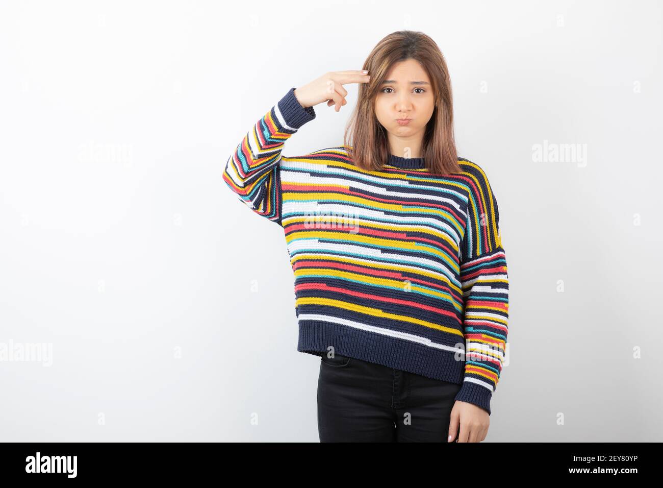 Portrait photo of a young cute woman model standing and posing Stock ...
