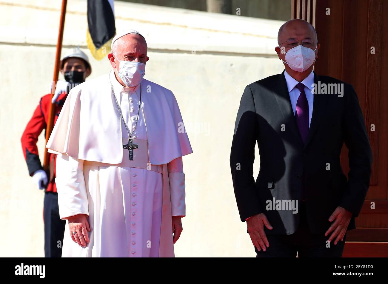Baghdad, Iraq. 05th Mar, 2021. Iraqi President Barham Saleh (R ...