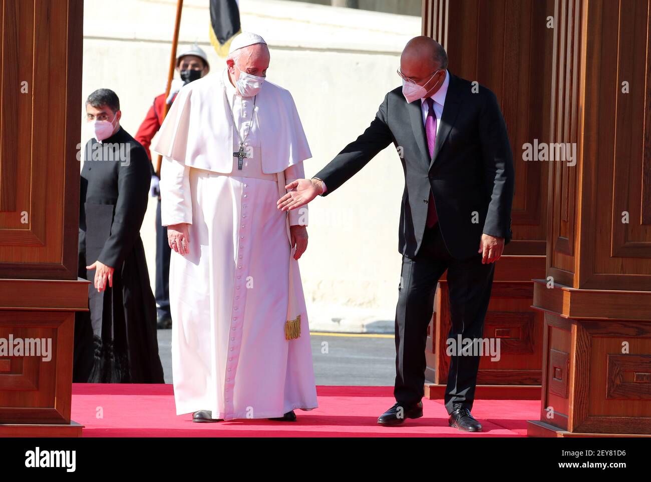 Baghdad, Iraq. 05th Mar, 2021. Iraqi President Barham Saleh (R ...