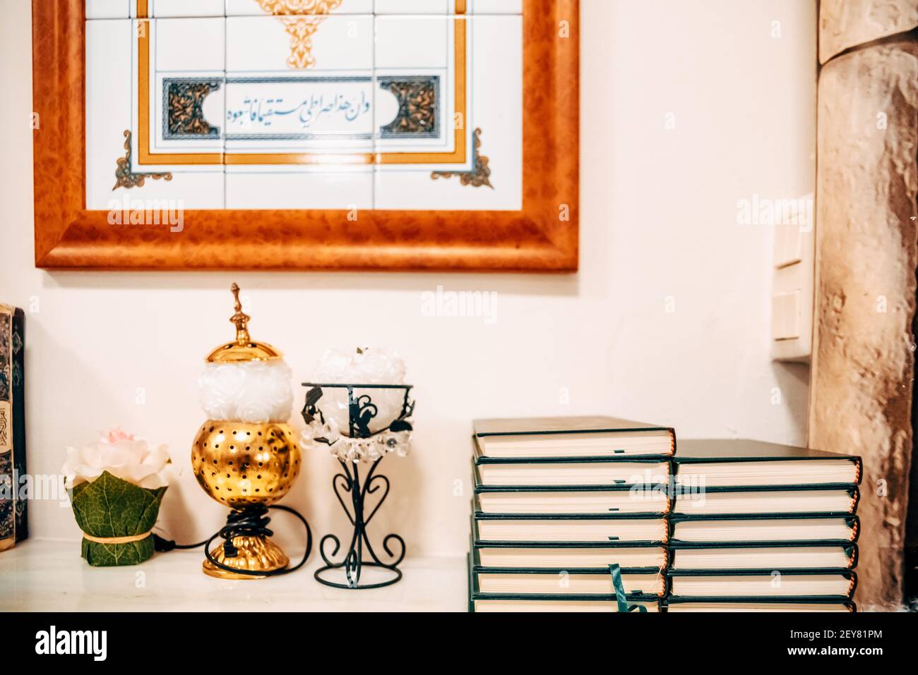 Koran books stacked inside an altar in a mosque Stock Photo - Alamy