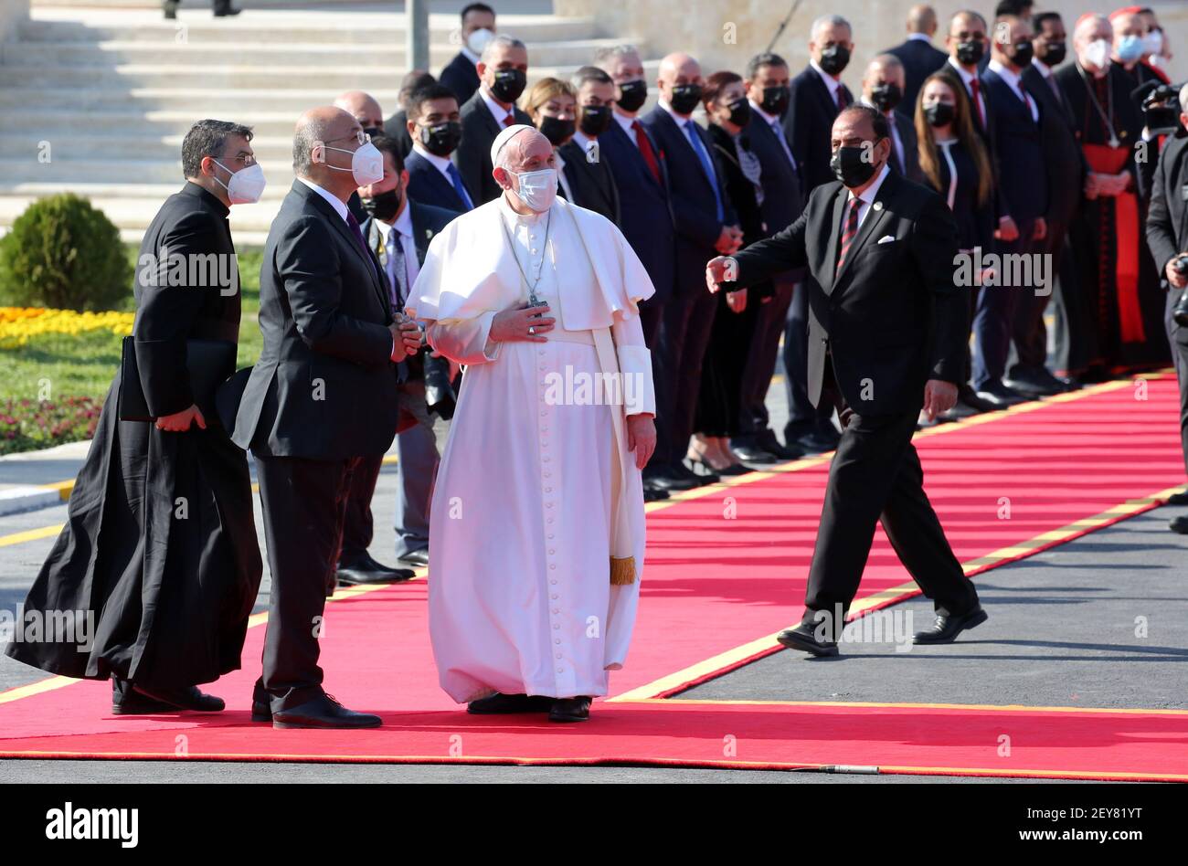 Baghdad, Iraq. 05th Mar, 2021. Iraqi President Barham Saleh (2L ...