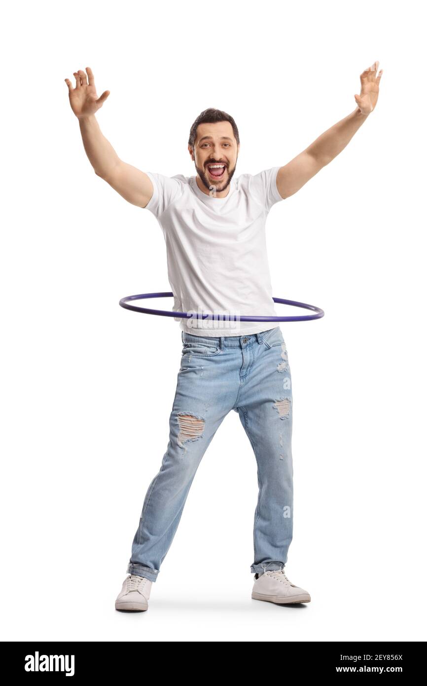 Full length portrait of a happy young man playing with a hula hoop ...