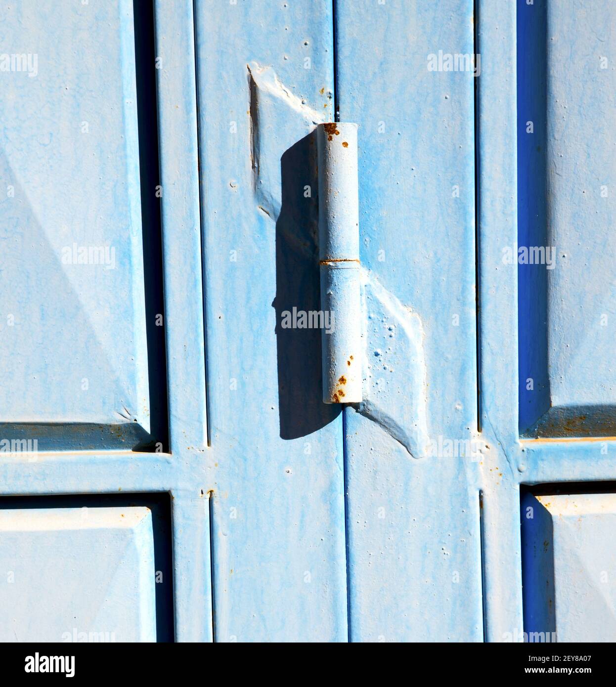 Blue hinges rusty morocco in africa the old wood facade home and safe padlock Stock Photo - Alamy