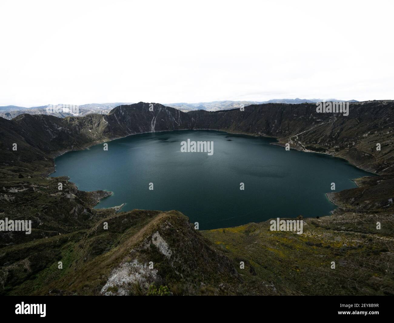 Panorama view of andean volcano caldera crater lake Quilotoa rim ridge ...
