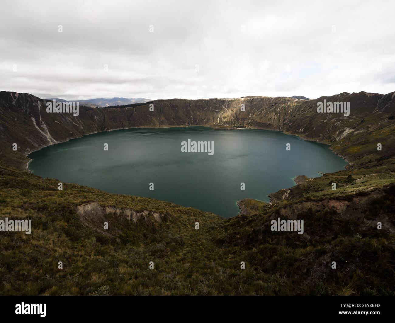 Panorama view of andean volcano caldera crater lake Quilotoa rim ridge ...