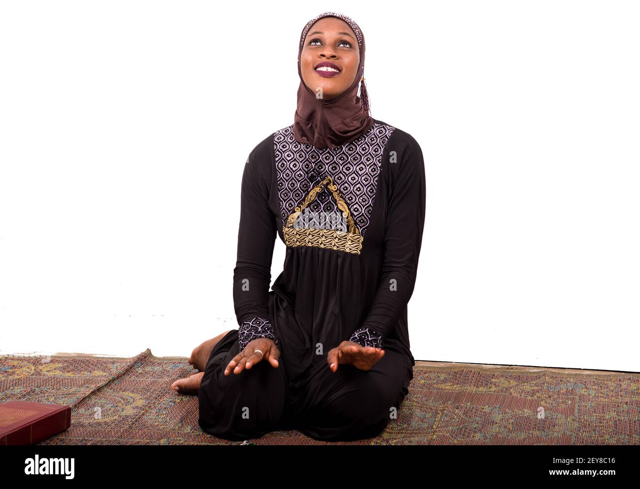 One woman praying looking up hi-res stock photography and images - Alamy