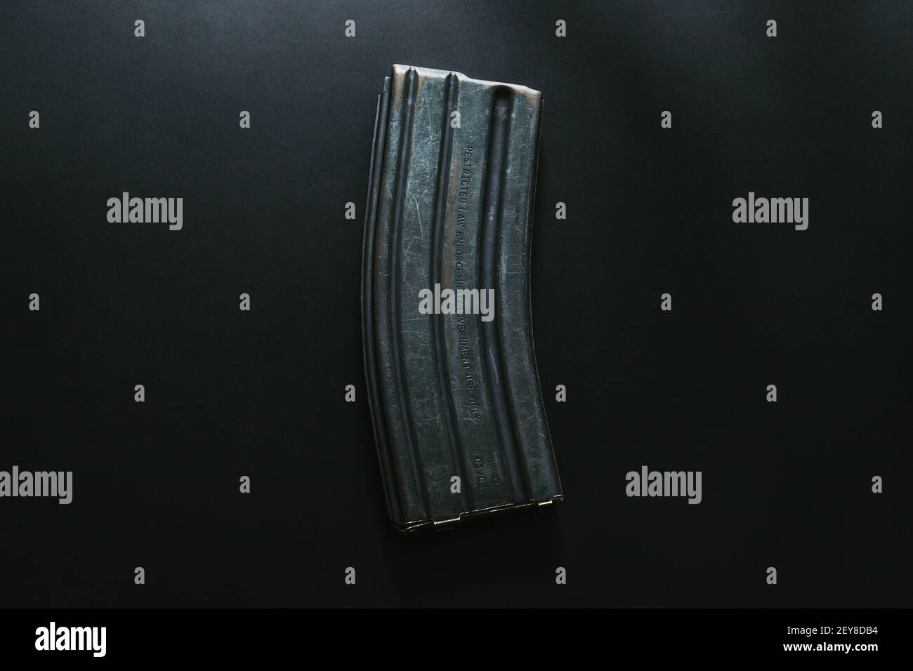 A top view of gun magazines on a black surface background Stock Photo ...