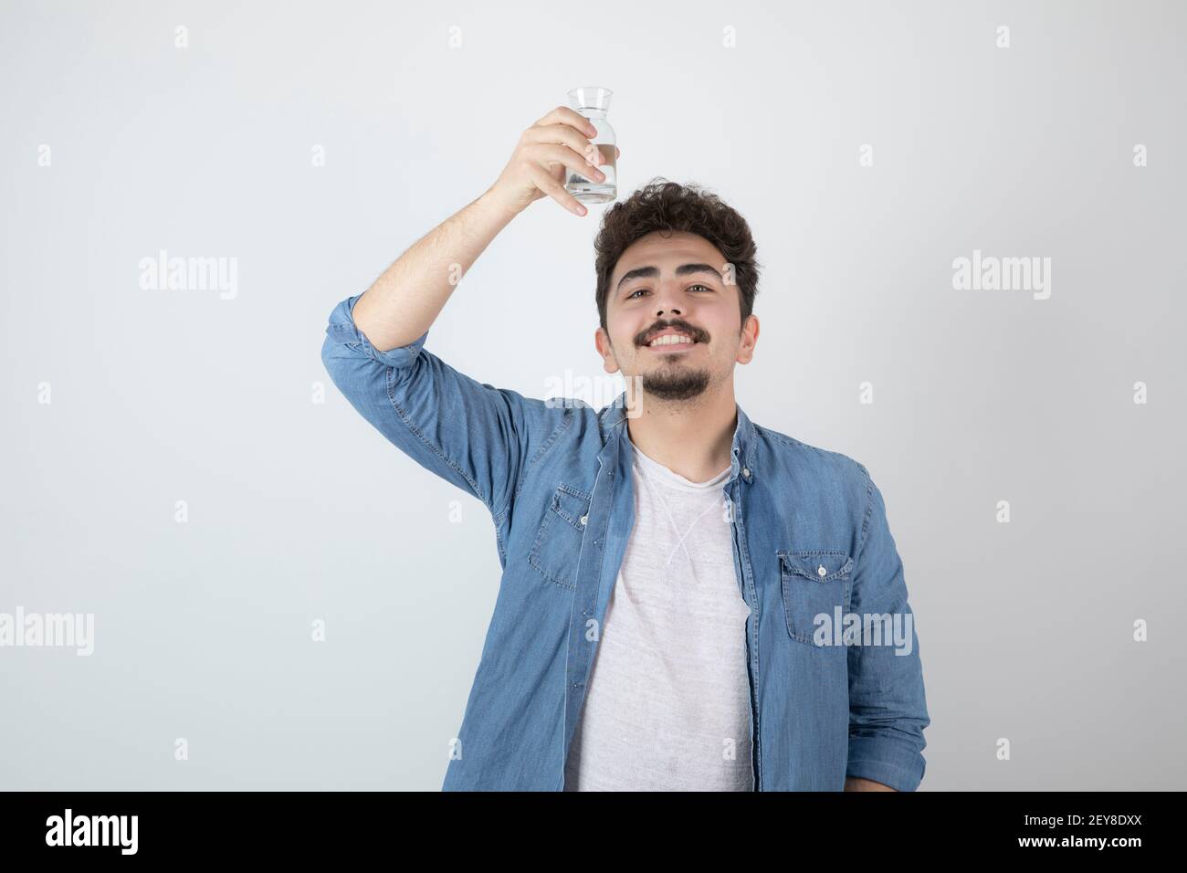 Smiling man posing glass hi-res stock photography and images - Alamy