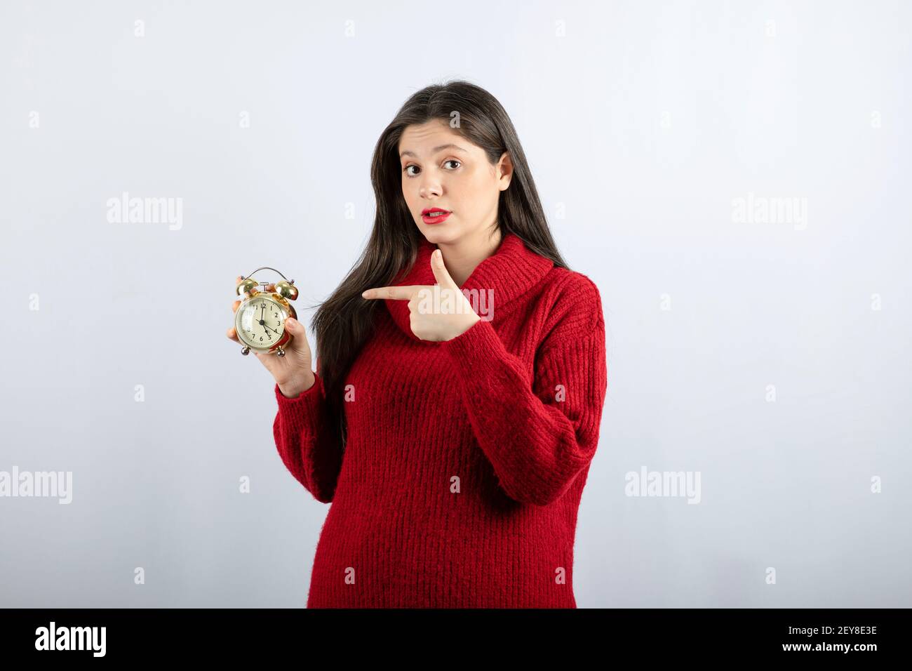 Hand pointing to time hi-res stock photography and images - Alamy