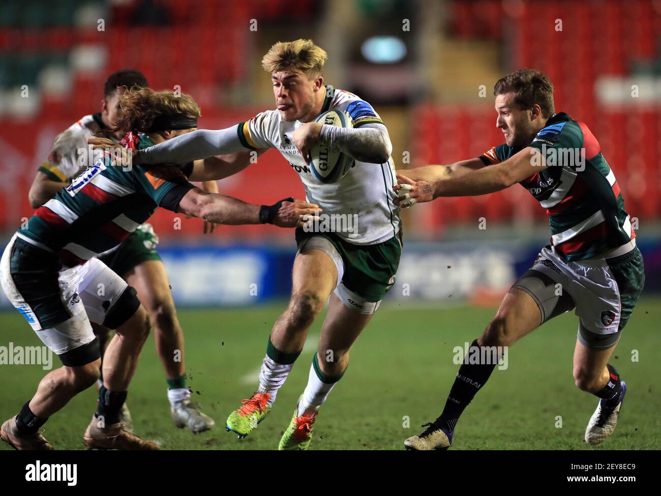 London Irish's Oliver Hassell-Collins tackled by Leicester Tigers' Luke ...