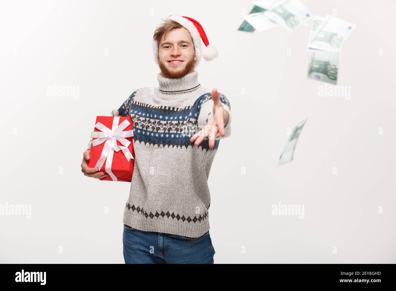 Santa claus throwing gift hi-res stock photography and images - Alamy