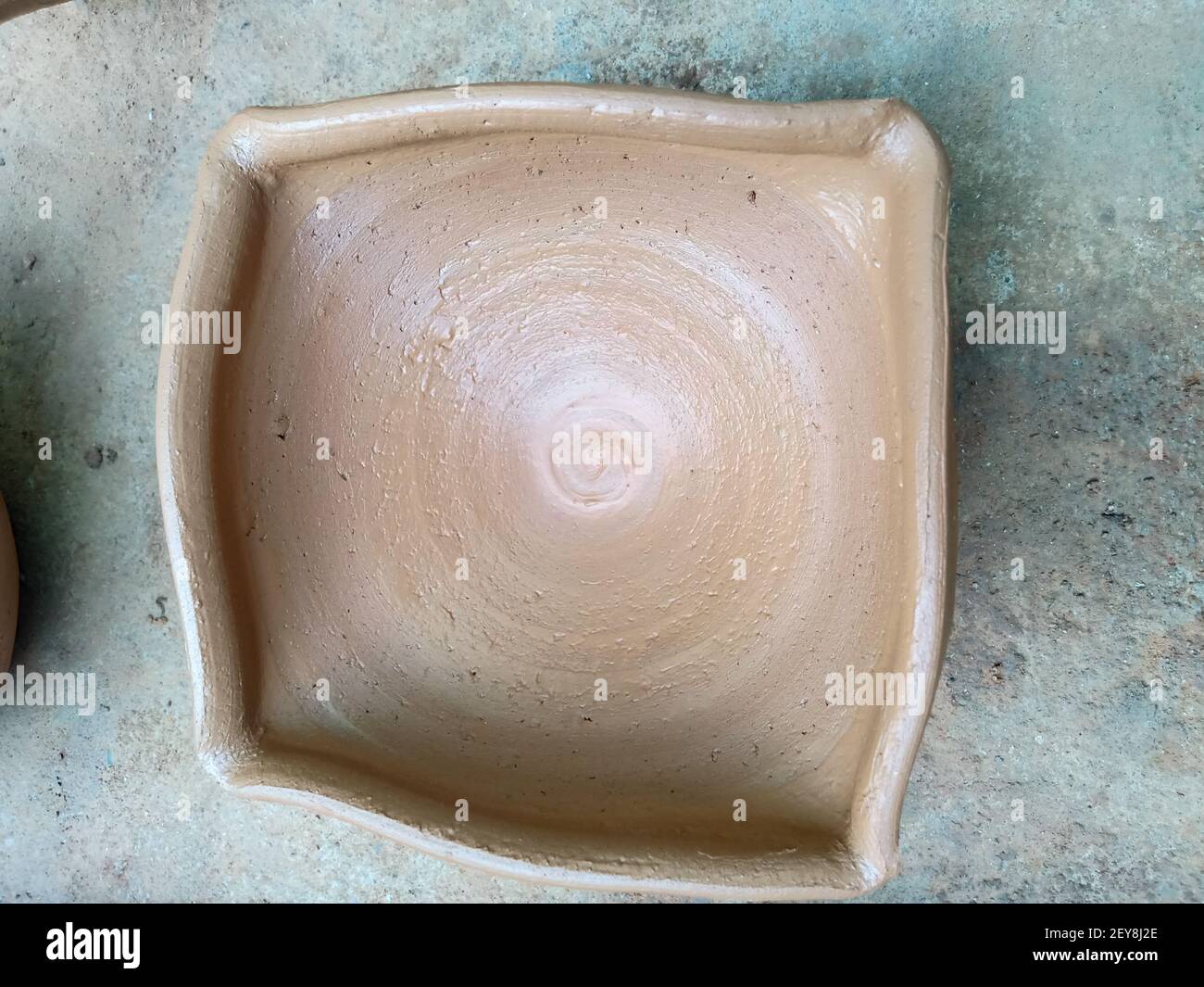 A top view of shallow square-shaped clay pot Stock Photo - Alamy