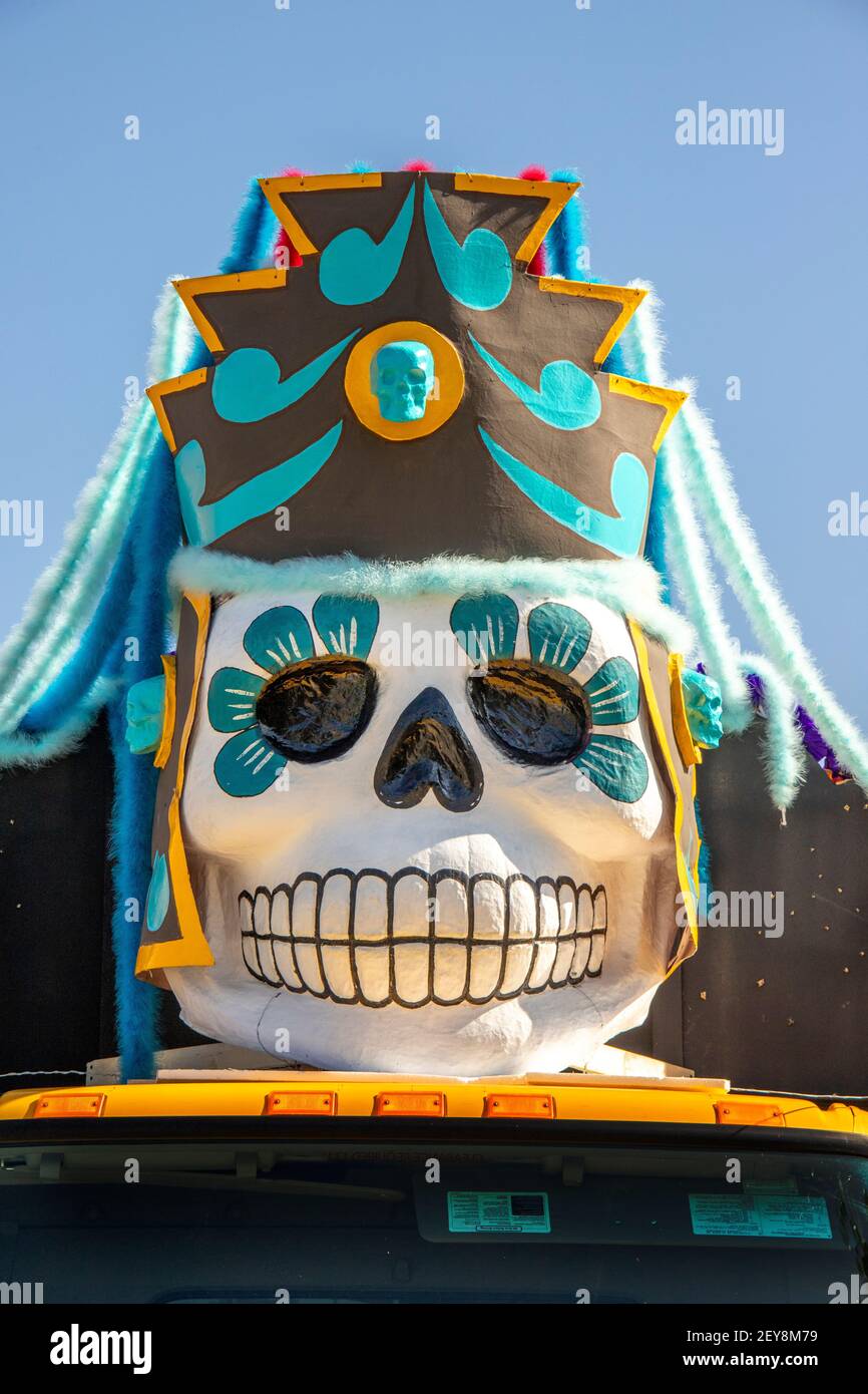 A truck is outfitted with a skeleton or calivera and a portable altar ...