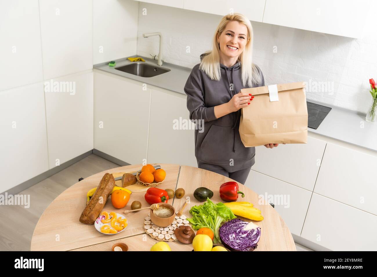 Healthy food. Woman preparing fruits and vegetables Stock Photo - Alamy