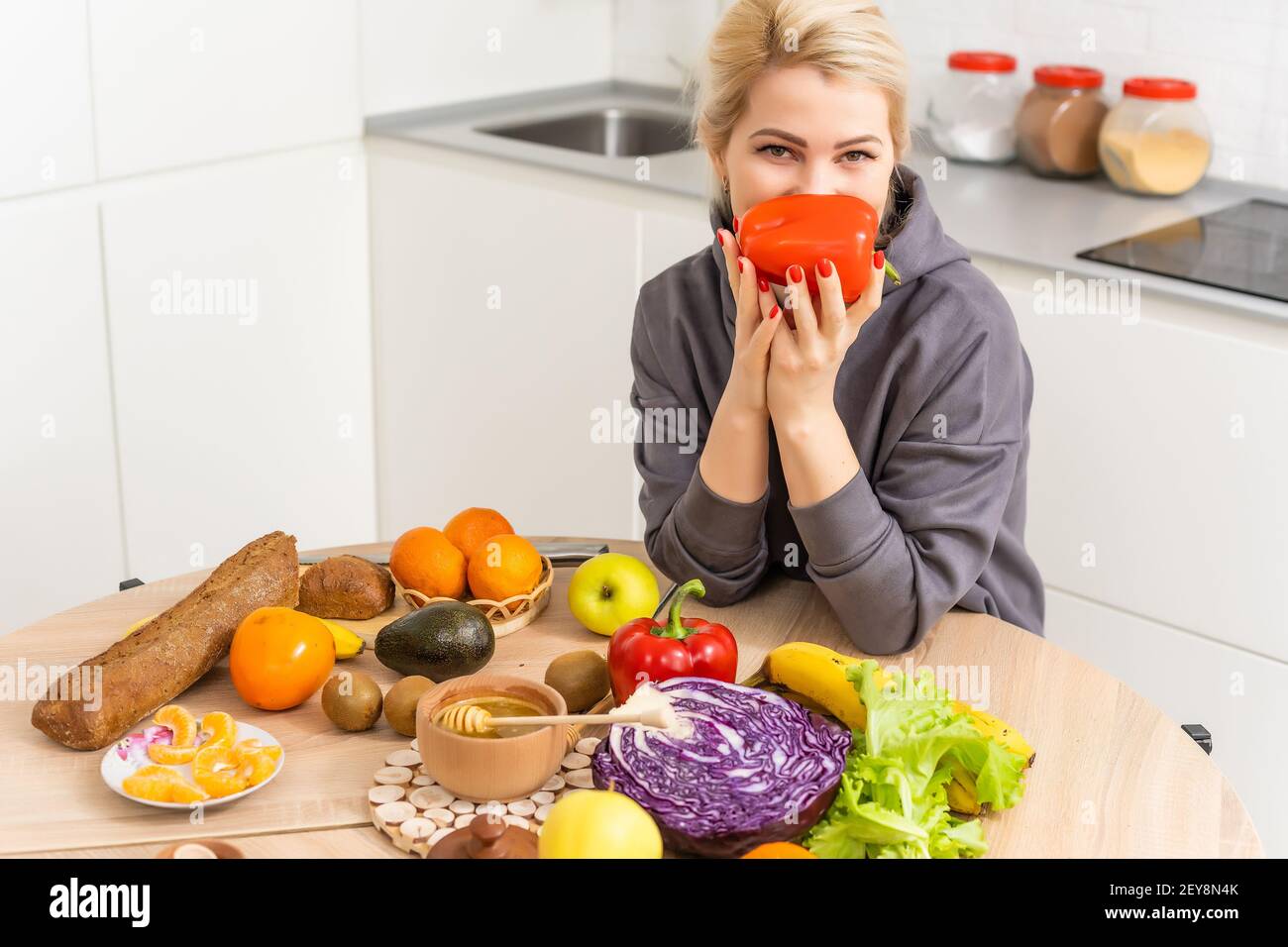 Healthy food. Woman preparing fruits and vegetables Stock Photo - Alamy
