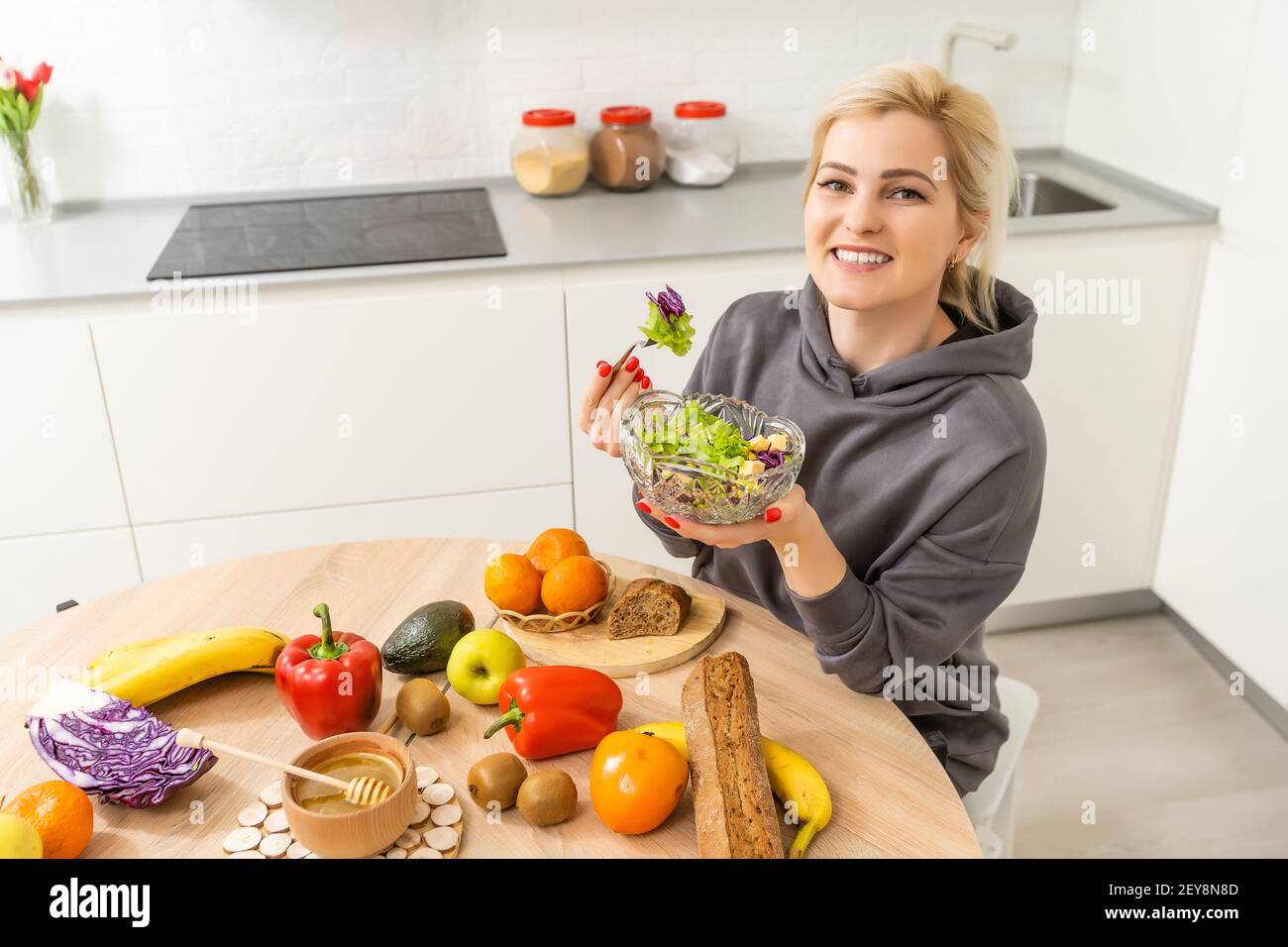 Healthy food. Woman preparing fruits and vegetables Stock Photo - Alamy