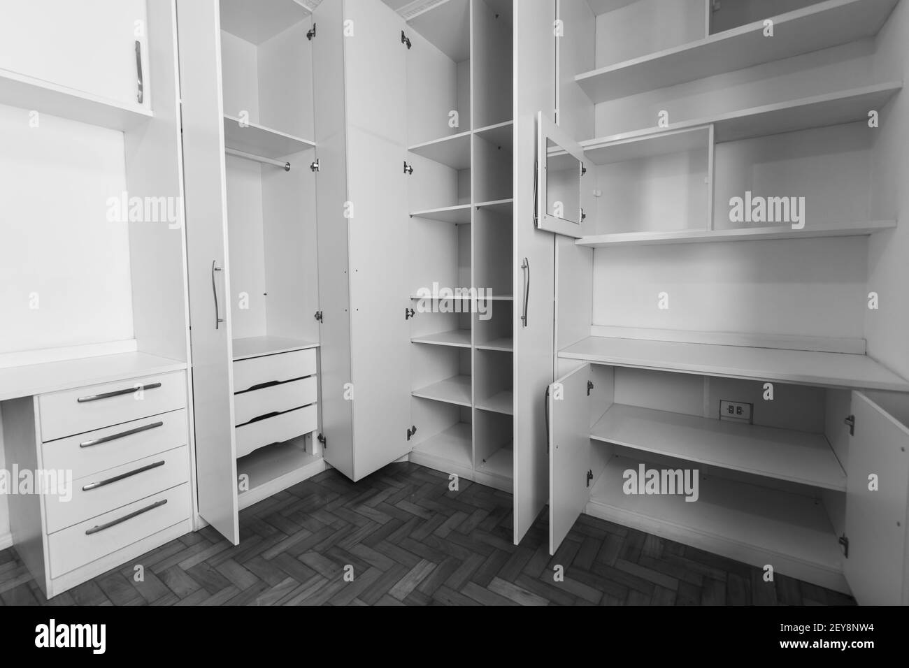 An empty apartment room interior with a white open empty closet Stock ...