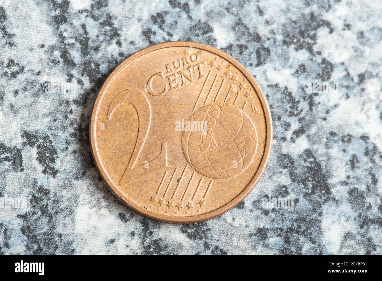 A high angle shot of a euro coin on a table Stock Photo - Alamy