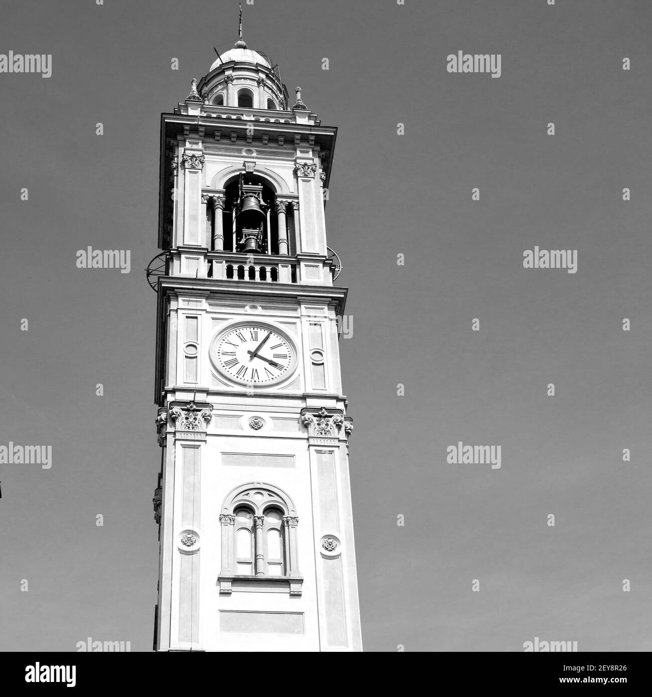 Monument clock tower in italy europe old stone and bell Stock Photo - Alamy