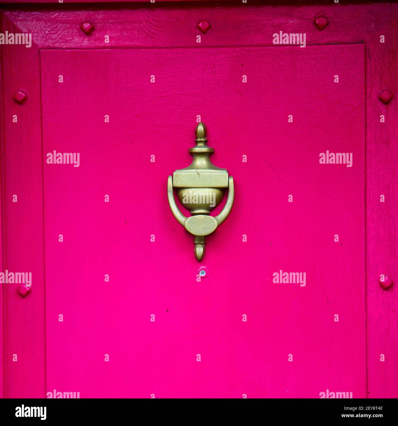 Red handle in london antique brown door rusty brass nail and light ...