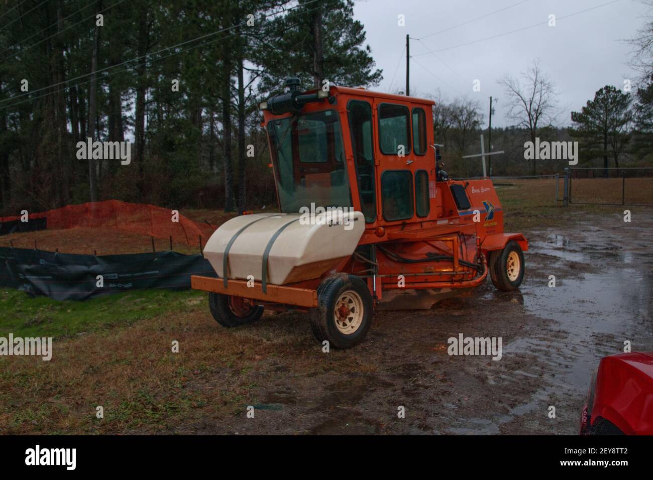 Augusta, Ga USA - 01 31 21: Orange Road sweeper at a construction site ...